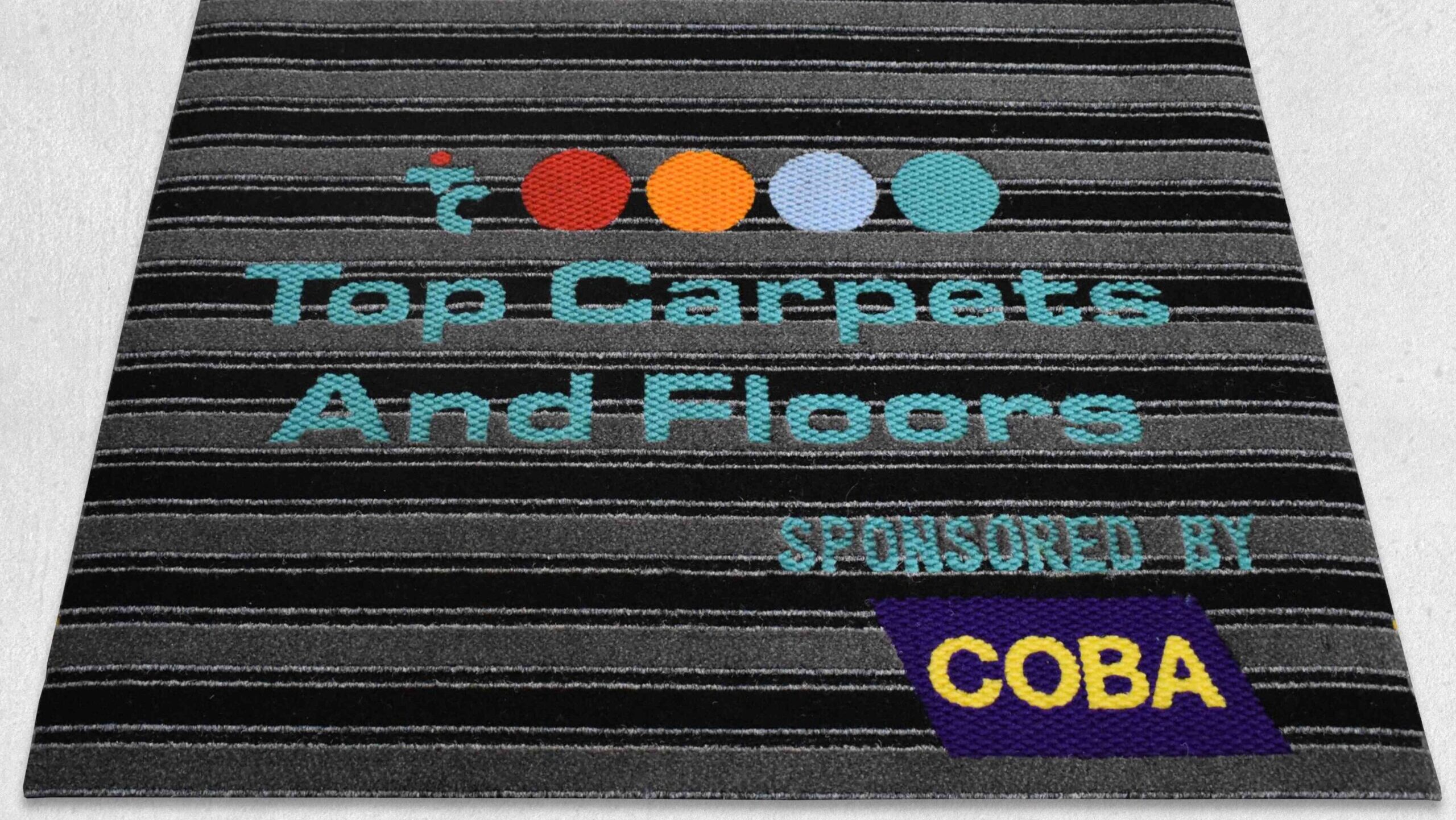 Custom-made logo mats at COBA